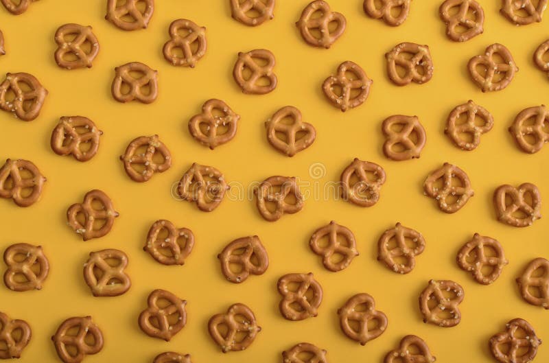 Mini Pretzels with Sesame Seeds As Pattern Stock Photo - Image of ...