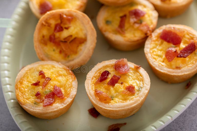 Mini Quiches with Bacon for Easter Brunch Stock Photo - Image of snack ...