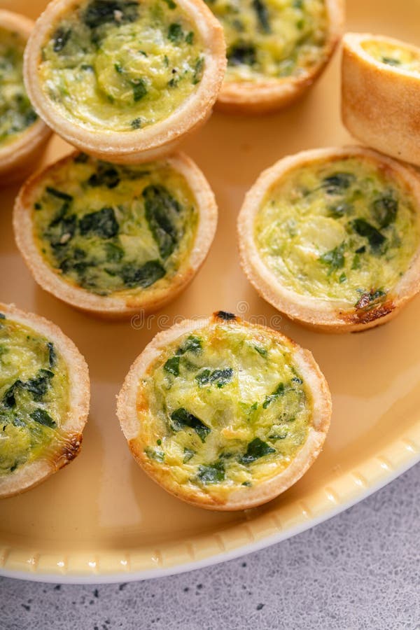 Mini Quiches with Spinach for Easter Brunch Stock Photo - Image of ...