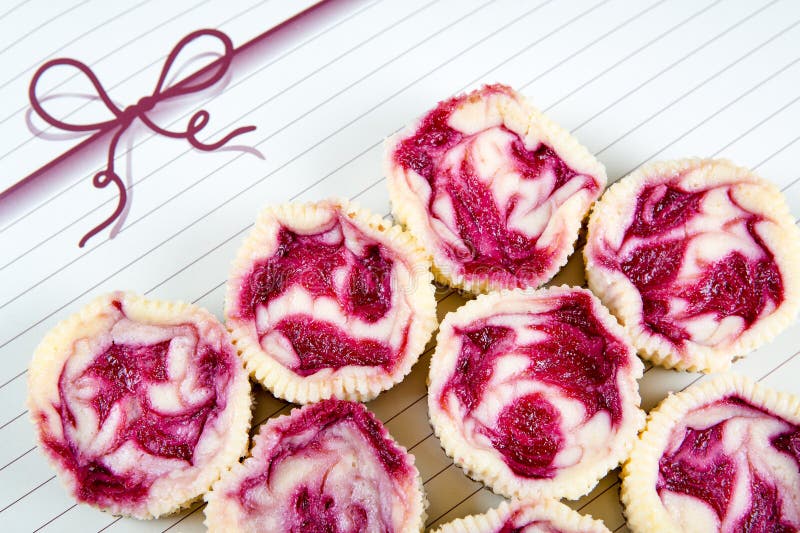 Mini Raspberry Cheesecakes in Muffin Forms Stock Photo - Image of food ...