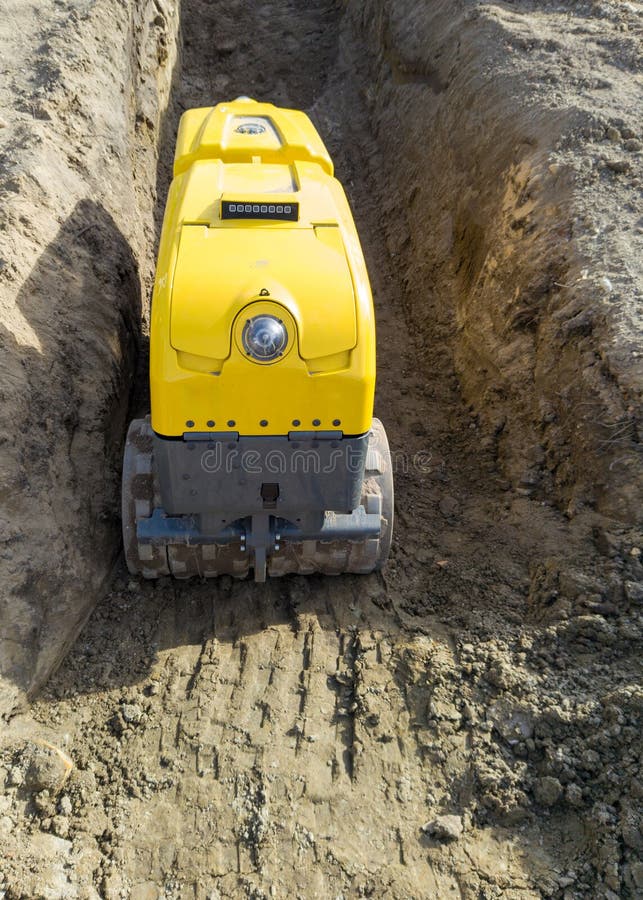 Remote-controlled Mini Compactor in Trench Stock Illustration ...