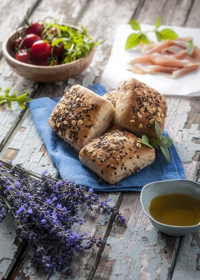 Mini Rustic Bread with Lavand Flower on the Side, Olive Oil, Rose Wine ...