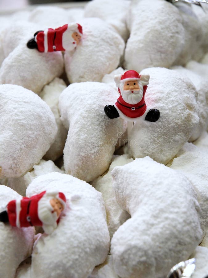 Mini Santas on pastries stock photo. Image of detail, clauses - 7412734