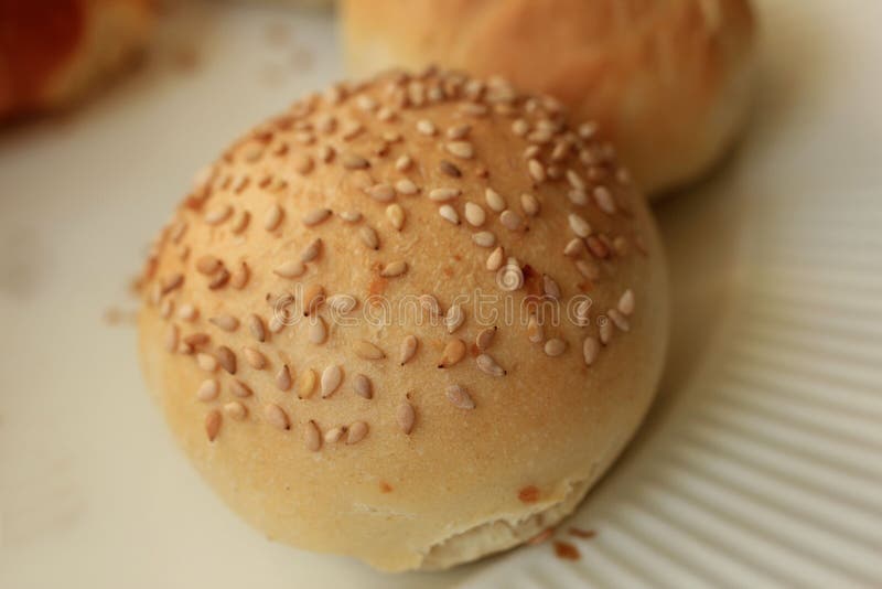 Fresh bun with sesame seed stock image. Image of loaf - 115575583
