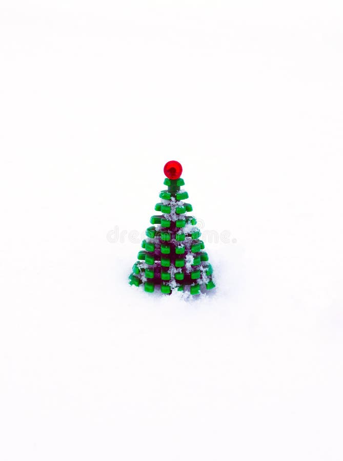 Mini snowy Christmas tree. stock photo. Image of artificial - 80662754