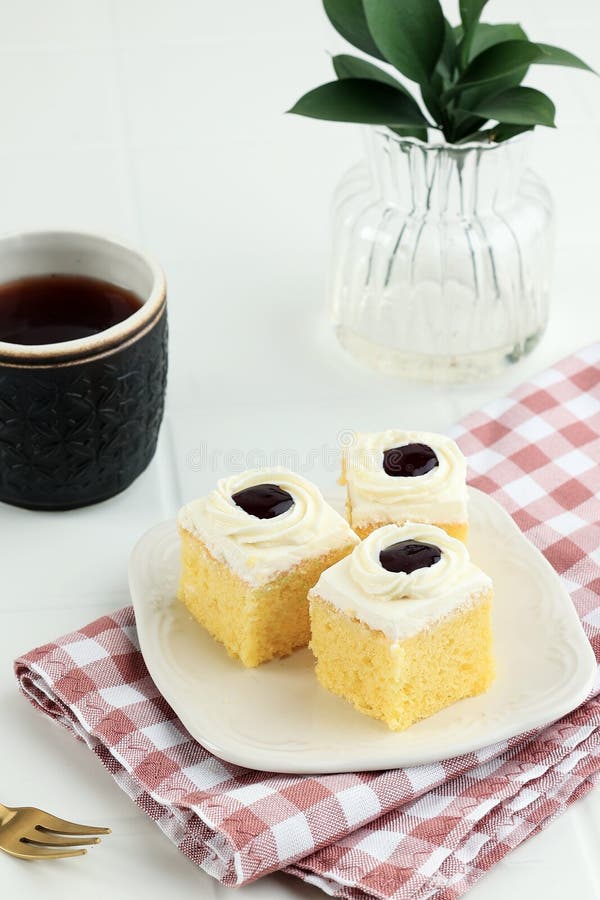 Mini Square Slice Cake with Bluberry Jam Topping Stock Photo - Image of ...