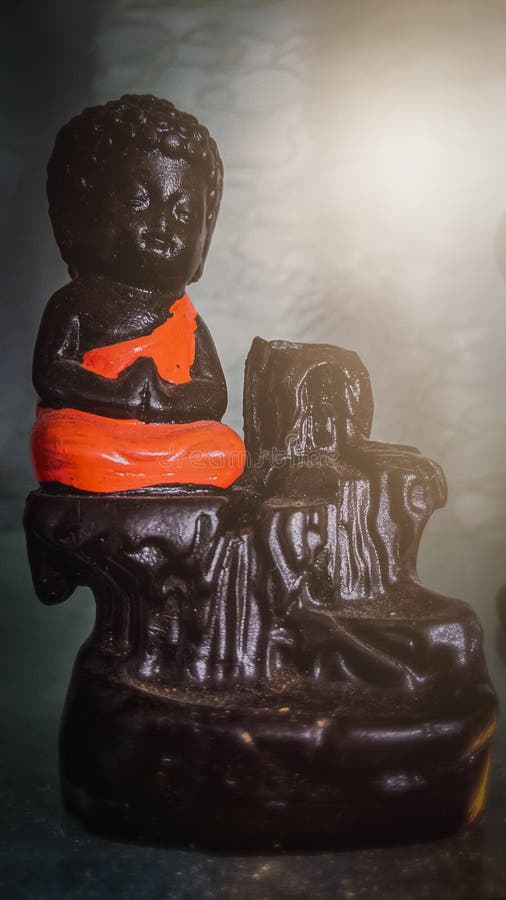 Mini Statue of a Monk Buddha Stock Image - Image of dessert, white ...