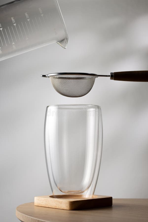 Mini Strainer Stainless Steel and Empty Glass Stock Image - Image of ...