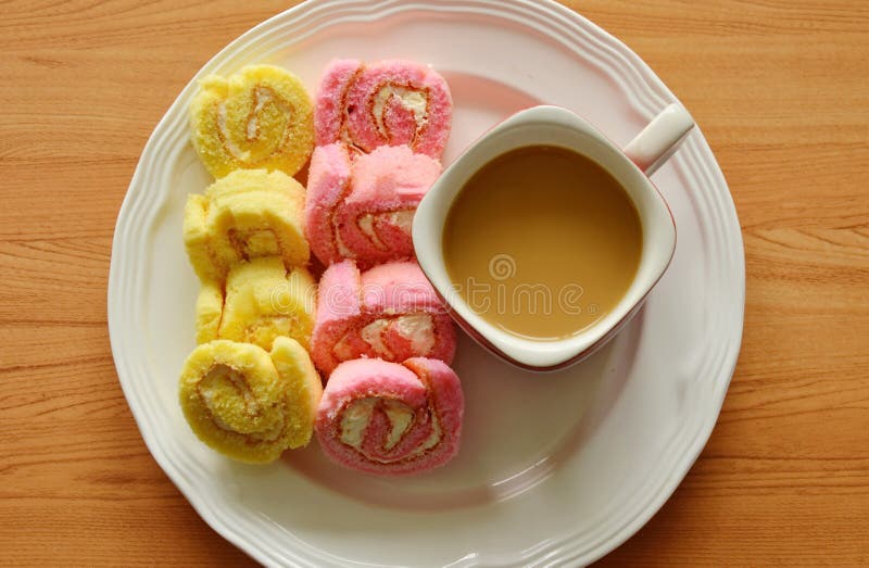 Mini Strawberry and Vanilla Jam Roll with Coffee on Dish Stock Image ...