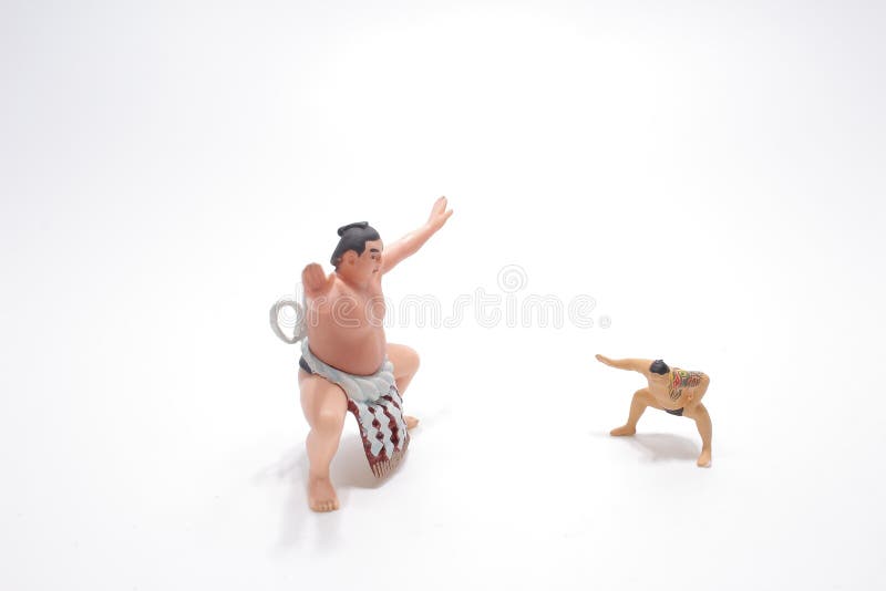 A Mini Sumo Figure are Fighting at Board Stock Photo - Image of play ...
