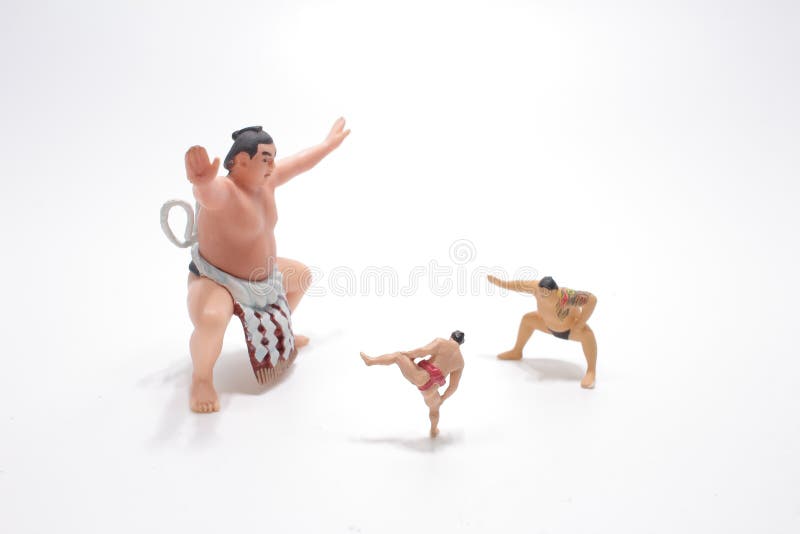 A Mini Sumo Figure are Fighting at Board Stock Image - Image of martial ...