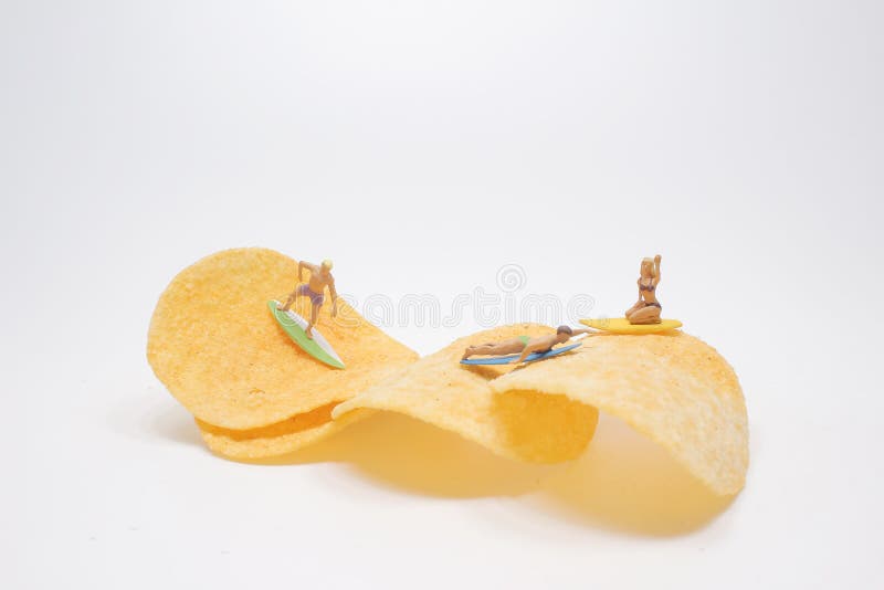 A Mini of Surfer , Surfing on Potato Chip Stock Image - Image of ...