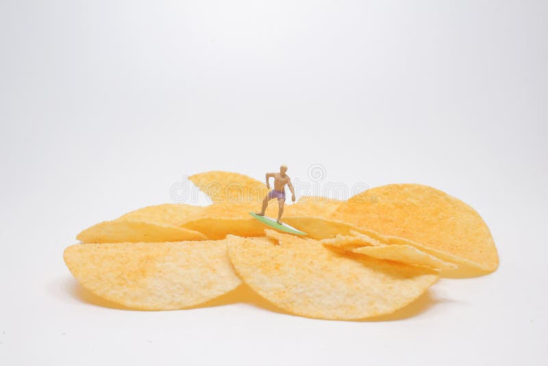 A Mini of Surfer , Surfing on Potato Chip Stock Image - Image of bunch ...