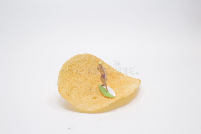 A Mini of Surfer , Surfing on Potato Chip Stock Image - Image of cutout ...