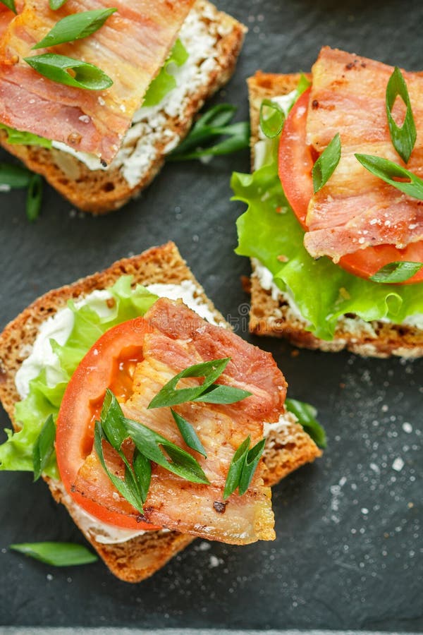 Mini Toast of Grain Bread with Tomatoes, Bacon, Lettuce and Green ...