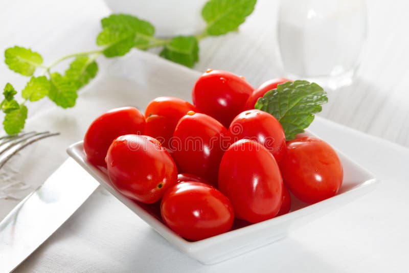 Mini tomatoes stock photo. Image of bowls, white, cherry - 36750258