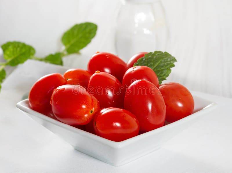 Mini tomatoes stock image. Image of food, eating, tableware - 37400075