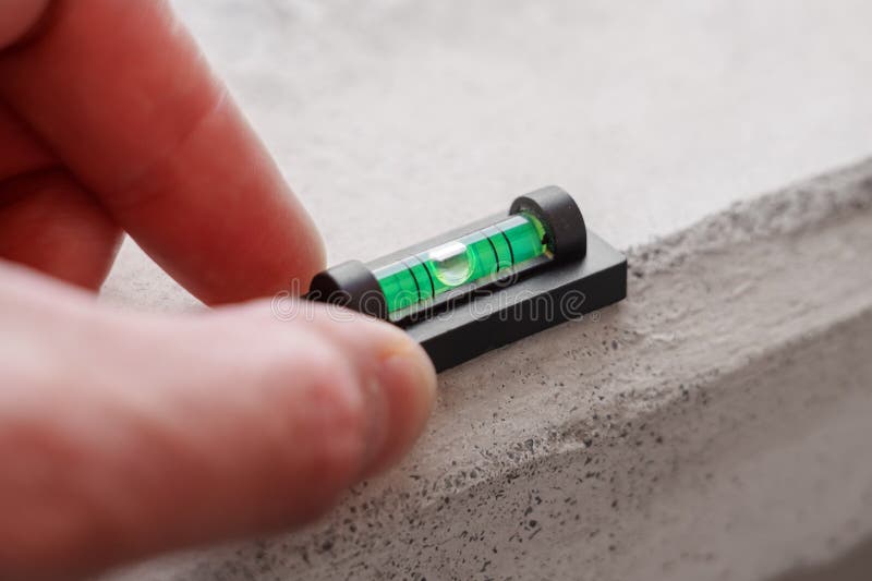 Mini Tool Spirit Level on Concrete Stock Image - Image of instrument ...