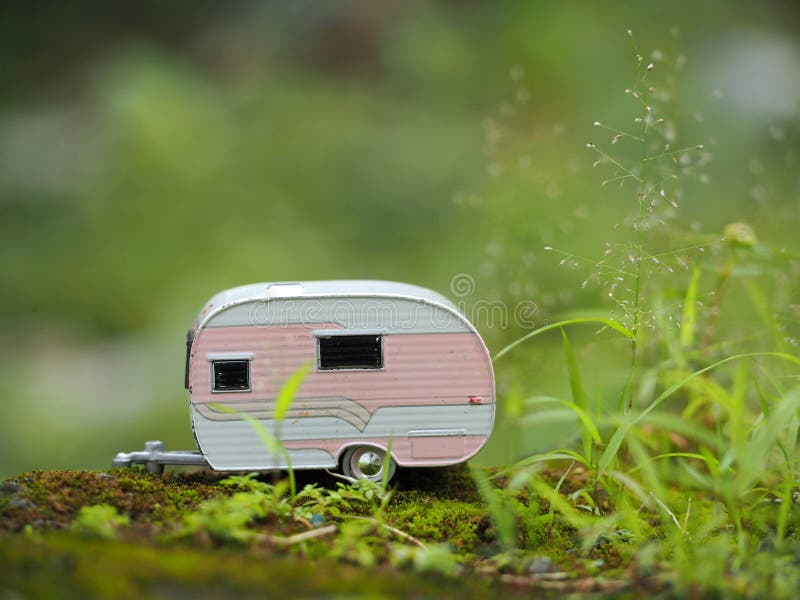 Mini Toy at Outdoor with Blurred Background. Vacation Concept Design ...
