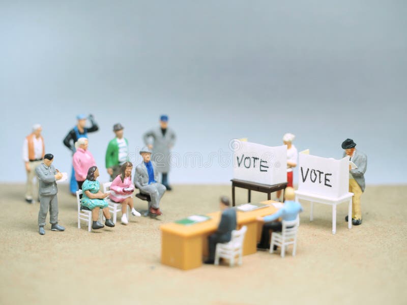 Mini Toy of People at Table with Blurred Background. Election Concept ...