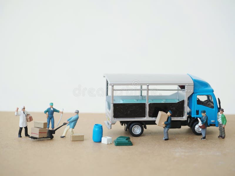 Mini Toy at Table with White Background. Industrial Shipping Concept ...