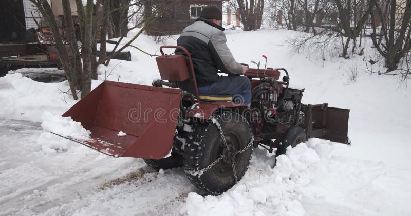Mini Tractor Stuck in the Snow in Winter Stock Video - Video of tractor ...