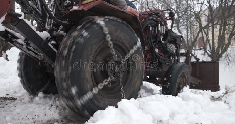 Mini Tractor Stuck in the Snow in Winter Stock Footage - Video of cold ...