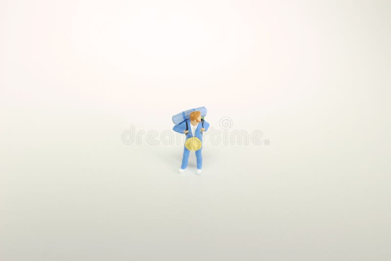 Mini Traveler Mini Figures with Backpack Standing Stock Image - Image ...