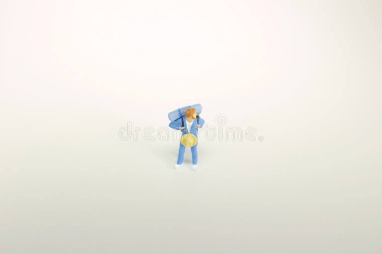 Mini Traveler Mini Figures with Backpack Standing Stock Image - Image ...