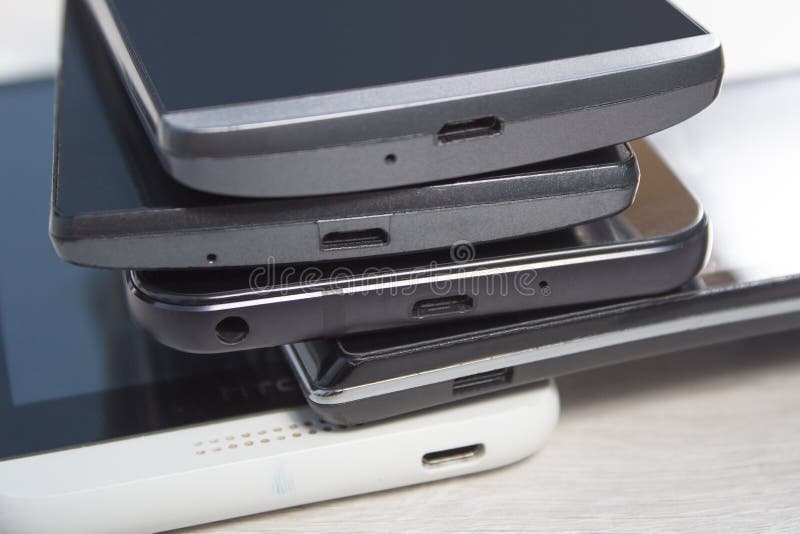 Mini Usb Ports in Mobile Phones Arranged One on Top of the Other. Stock ...