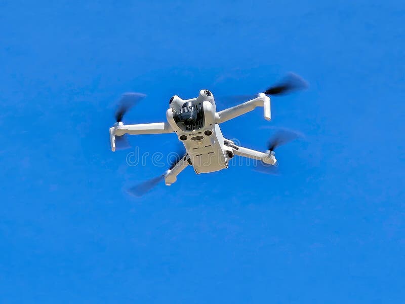 Mini White Drone in Blue Sky Stock Photo - Image of small, aircraft ...