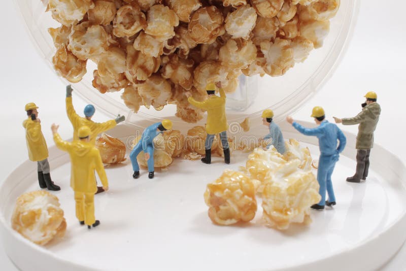 A Mini Worker Figure Face the Throw Popcorn Stock Image - Image of ...