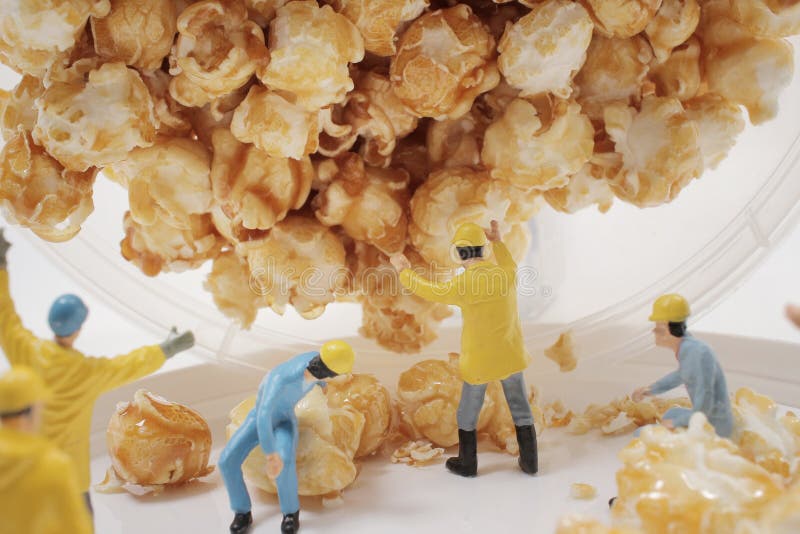 A Mini Worker Figure Face the Throw Popcorn Stock Image - Image of ...
