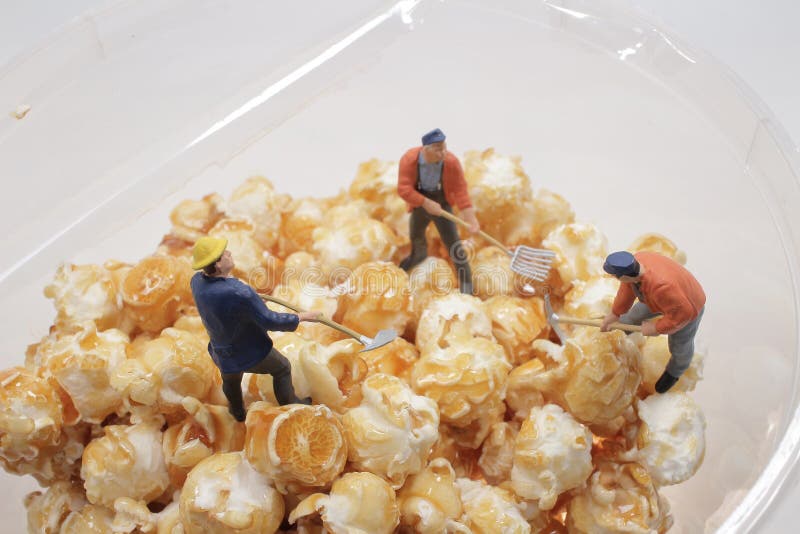 A Mini Worker Figure Face the Throw Popcorn Stock Photo - Image of ...