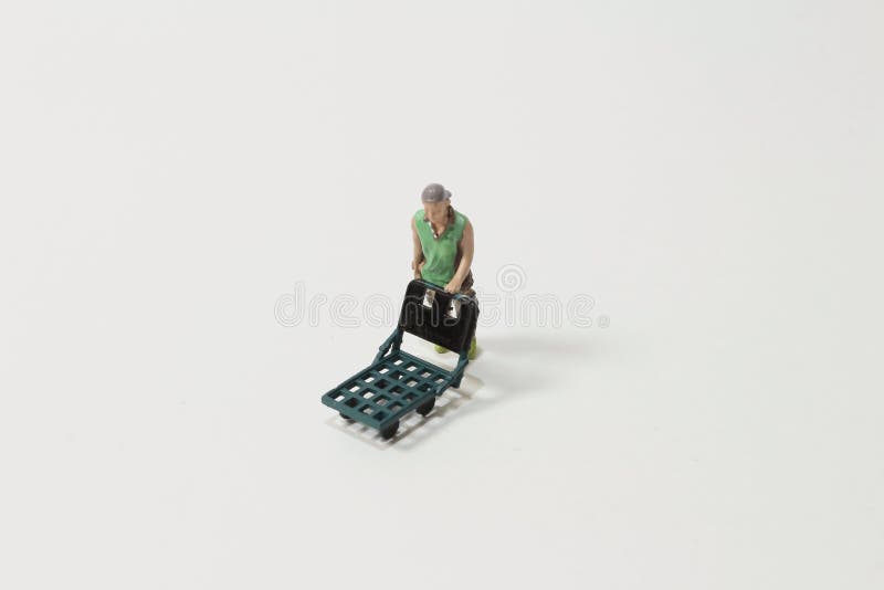 A Mini Worker Figure Move the Products Stock Image - Image of parcel ...