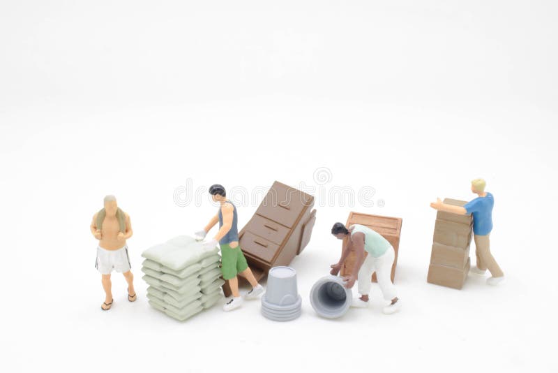 A Mini Worker Figure Move the Products Stock Photo - Image of tiny ...