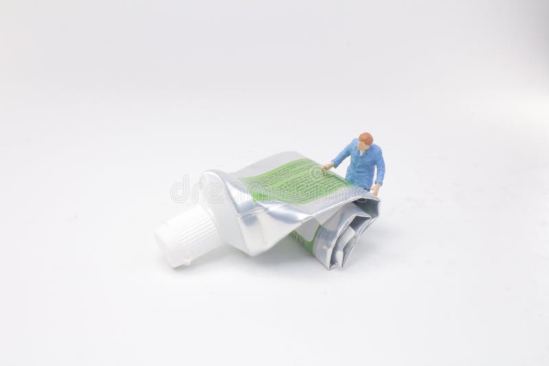 Mini Worker of Figure Push the Toothpaste Stock Photo - Image of ...