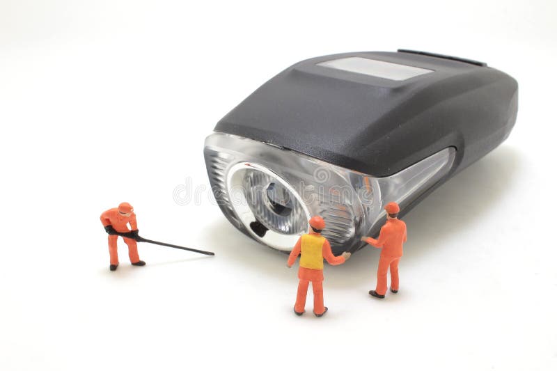 A Mini of Worker Figure with Torch Stock Photo - Image of charge, build ...