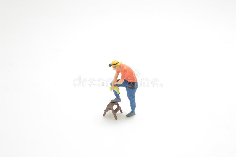 Mini Worker Figure on Working with Tool Stock Photo - Image of ...