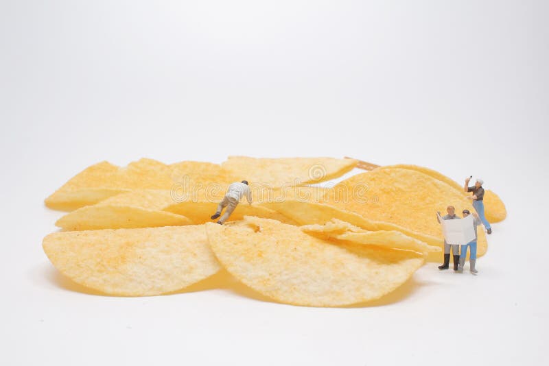A Mini Worker are Working with Potato Chips Stock Photo - Image of ...