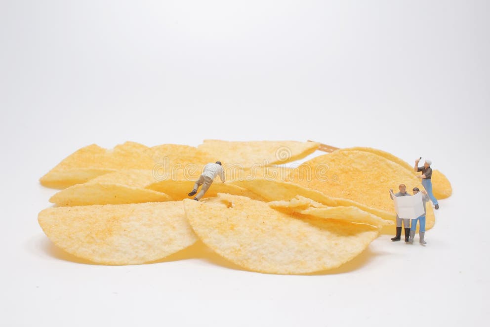 A Mini Worker are Working with Potato Chips Stock Photo - Image of ...