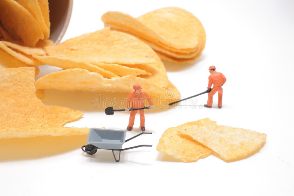 A Mini Worker are Working with Potato Chips Stock Photo - Image of ...