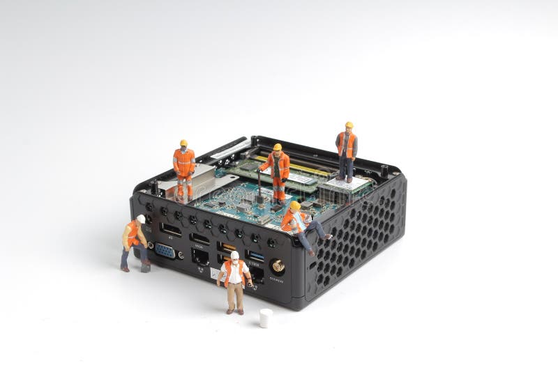 The Mini of Workers on Computer Mother Board Stock Photo - Image of ...