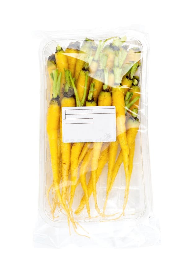 Mini Yellow Carrots in Labeled Packaging on a White Background Stock ...