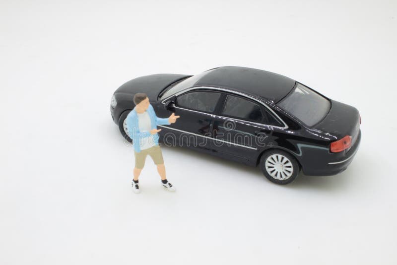 A Mini Young Figure with Beard Pointing Away Stock Photo - Image of ...