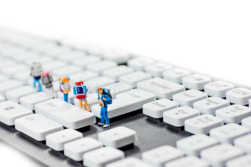 Miniature Backpackers on Top of the Keyboard. Stock Photo - Image of ...