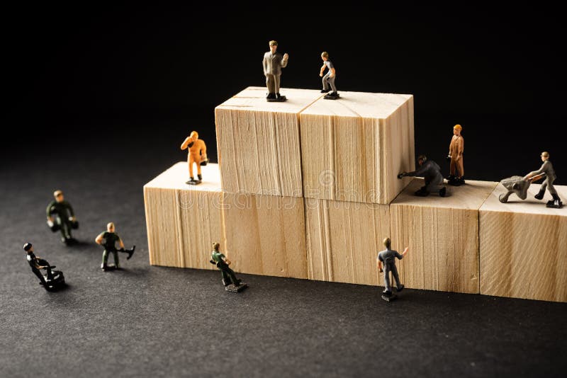 Miniature Builder Figures with Wooden Blocks Stock Photo - Image of ...
