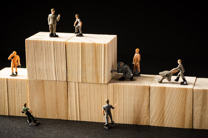 Miniature Builder Figures with Wooden Blocks Stock Photo - Image of ...