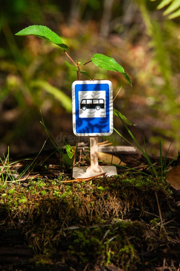 Miniature Bus Stop Road Sign into the Shadow Stock Image - Image of ...