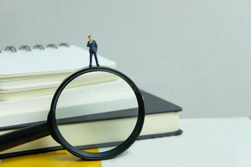 Miniature Business Concept - Searching and Thinking a Resolution. Mini ...